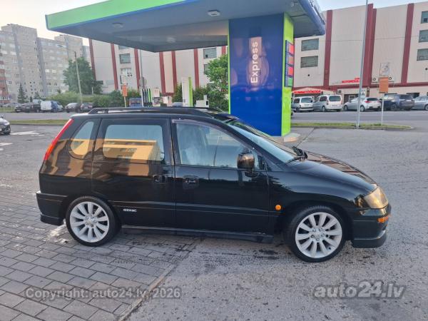 Melns Mitsubishi space-runner 2001 Tallina, ar dzinēja tilpumu 2.40 L un nobraukumu 162 tūkst. km par 1990 €, foto 4 vietnē AUTOMOTO.COM.LV