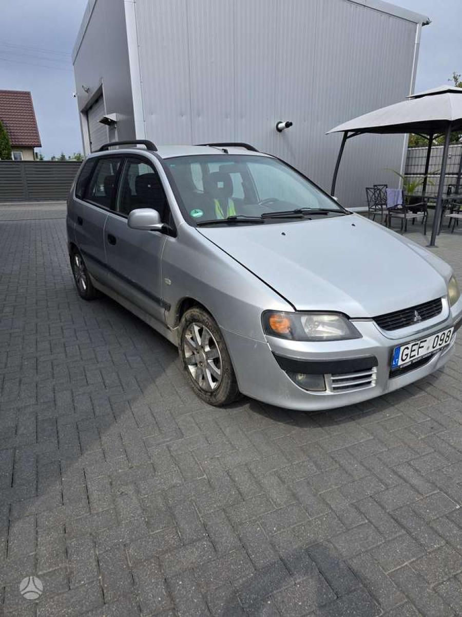 Pelēks Mitsubishi Space Star 2004 Viļņa, ar dzinēja tilpumu 1.58 L un nobraukumu 240 tūkst. km par 650 €, foto 1 vietnē AUTOMOTO.COM.LV