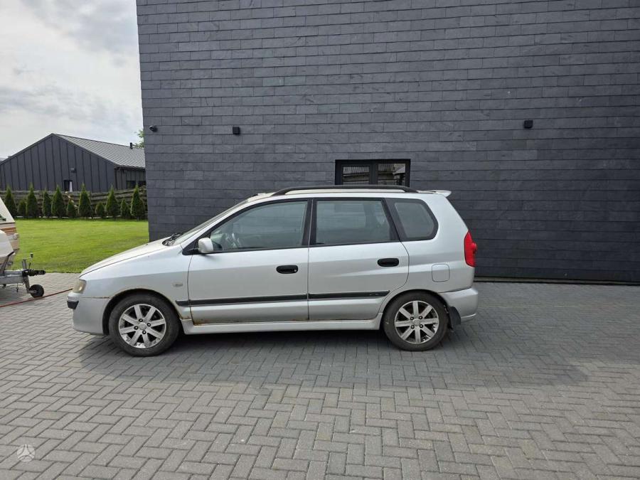Pelēks Mitsubishi Space Star 2004 Viļņa, ar dzinēja tilpumu 1.58 L un nobraukumu 240 tūkst. km par 650 €, foto 4 vietnē AUTOMOTO.COM.LV