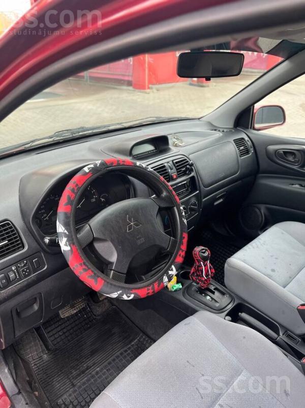 Sarkans Mitsubishi Space Star 2002 Rīga, ar dzinēja tilpumu 1.80 L un nobraukumu 112 tūkst. km par 1200 €, foto 6 vietnē AUTOMOTO.COM.LV