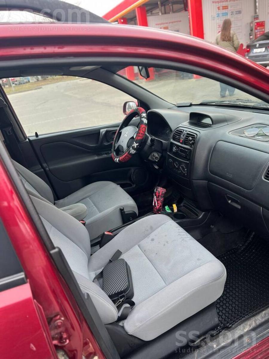 Sarkans Mitsubishi Space Star 2002 Rīga, ar dzinēja tilpumu 1.80 L un nobraukumu 112 tūkst. km par 1200 €, foto 8 vietnē AUTOMOTO.COM.LV