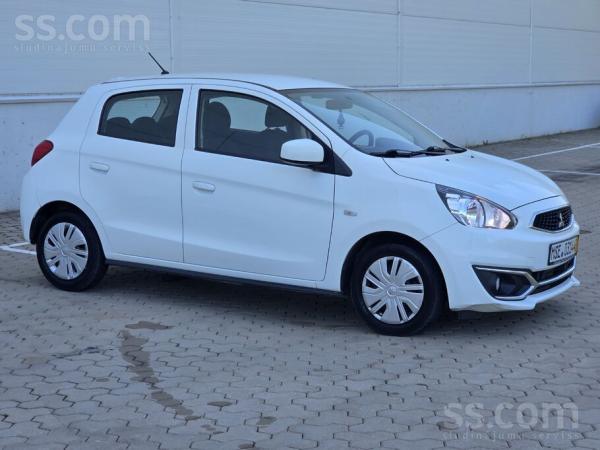 White Mitsubishi Space Star 2018 in Riga, with an engine capacity of 1.00 L and mileage of 90 thousand km for 5200 €, photo 10 on AUTOMOTO.COM.LV