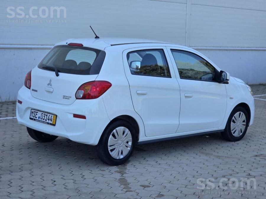 White Mitsubishi Space Star 2018 in Riga, with an engine capacity of 1.00 L and mileage of 90 thousand km for 5200 €, photo 14 on AUTOMOTO.COM.LV