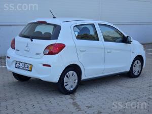 White Mitsubishi Space Star 2018 in Riga, with an engine capacity of 1.00 L and mileage of 90 thousand km for 5200 €, photo 15 on AUTOMOTO.COM.LV