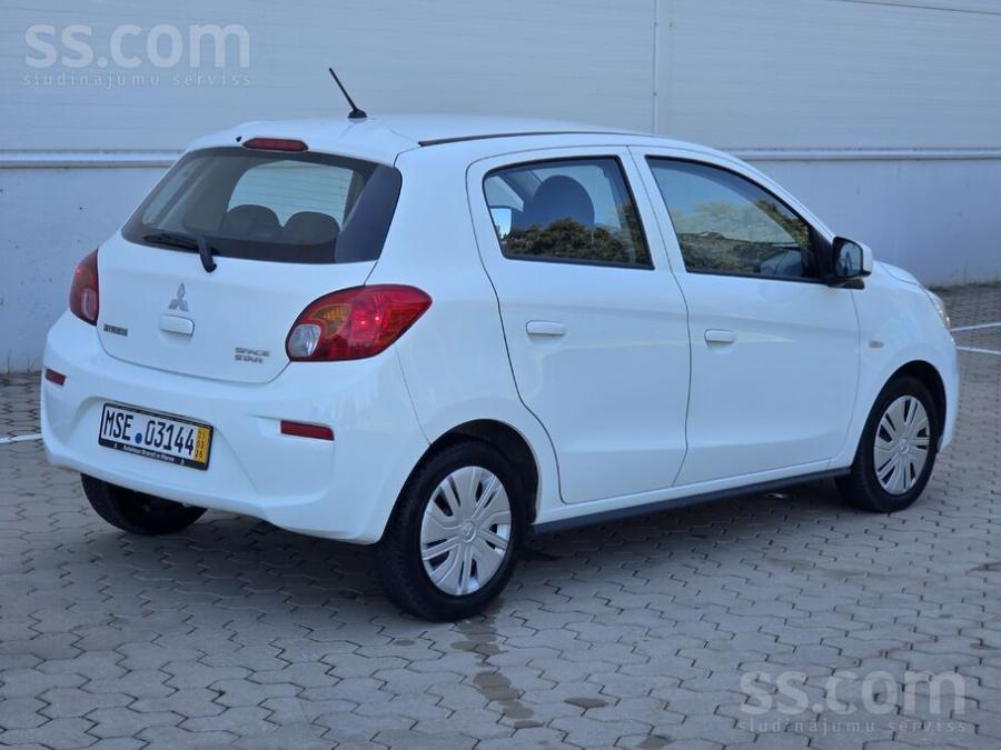 White Mitsubishi Space Star 2018 in Riga, with an engine capacity of 1.00 L and mileage of 90 thousand km for 5200 €, photo 15 on AUTOMOTO.COM.LV