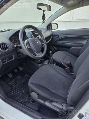 White Mitsubishi Space Star 2018 in Riga, with an engine capacity of 1.00 L and mileage of 90 thousand km for 5200 €, photo 23 on AUTOMOTO.COM.LV