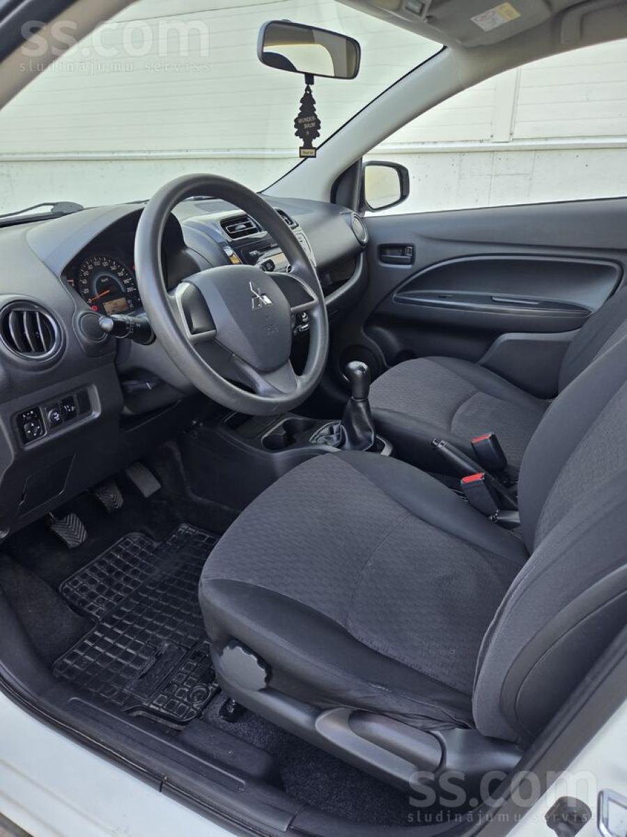 White Mitsubishi Space Star 2018 in Riga, with an engine capacity of 1.00 L and mileage of 90 thousand km for 5200 €, photo 23 on AUTOMOTO.COM.LV
