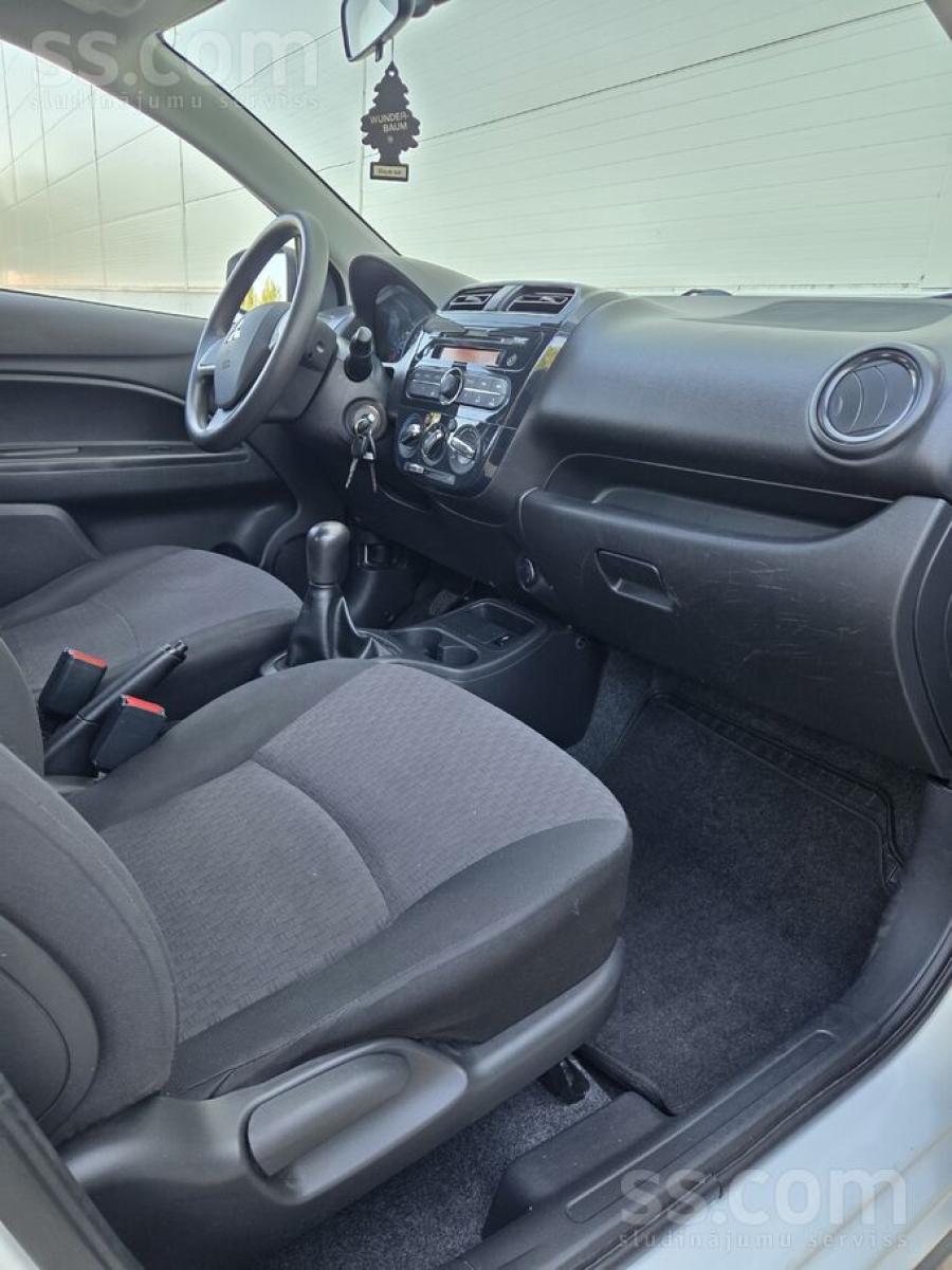 White Mitsubishi Space Star 2018 in Riga, with an engine capacity of 1.00 L and mileage of 90 thousand km for 5200 €, photo 25 on AUTOMOTO.COM.LV