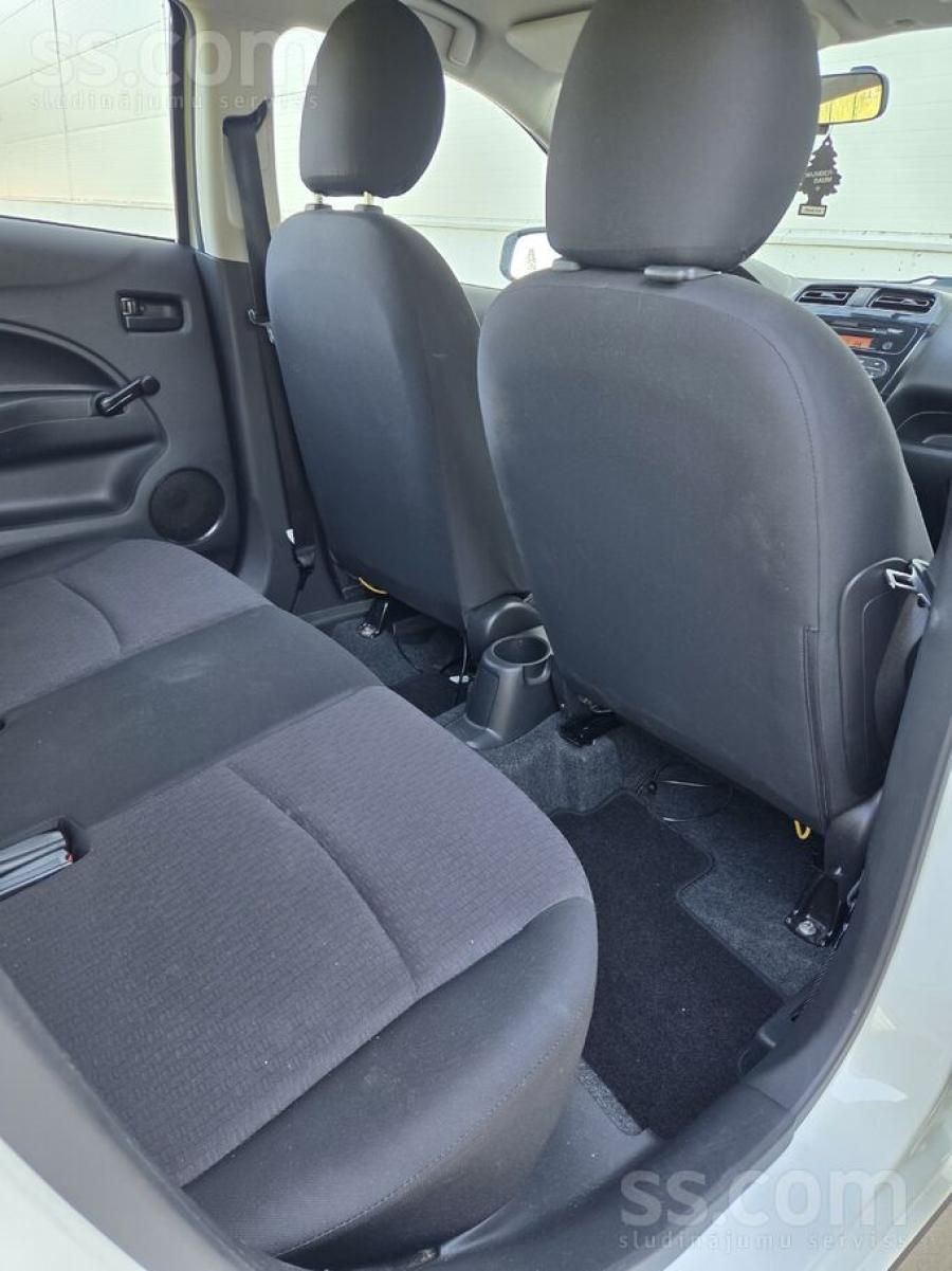 White Mitsubishi Space Star 2018 in Riga, with an engine capacity of 1.00 L and mileage of 90 thousand km for 5200 €, photo 26 on AUTOMOTO.COM.LV