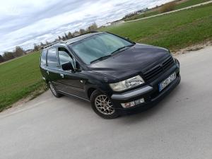 Black Mitsubishi Space Wagon 2005 in Siauliai, with an engine capacity of 2.40 L and mileage of 120 thousand km for 1550 €, photo  on AUTOMOTO.COM.LV