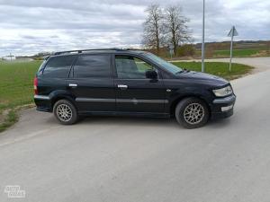 Black Mitsubishi Space Wagon 2005 in Siauliai, with an engine capacity of 2.40 L and mileage of 120 thousand km for 1550 €, photo 10 on AUTOMOTO.COM.LV
