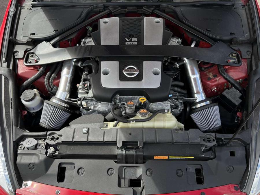 Red Nissan 370-z 2016 in Vilnius, with an engine capacity of 3.70 L and mileage of 25 thousand km for 18490 €, photo 27 on AUTOMOTO.COM.LV