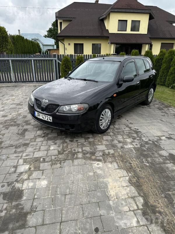 Black Nissan Almera 2003 in Jelgava, with an engine capacity of 2.20 L and mileage of 370 thousand km for 1090 €, photo 1 on AUTOMOTO.COM.LV