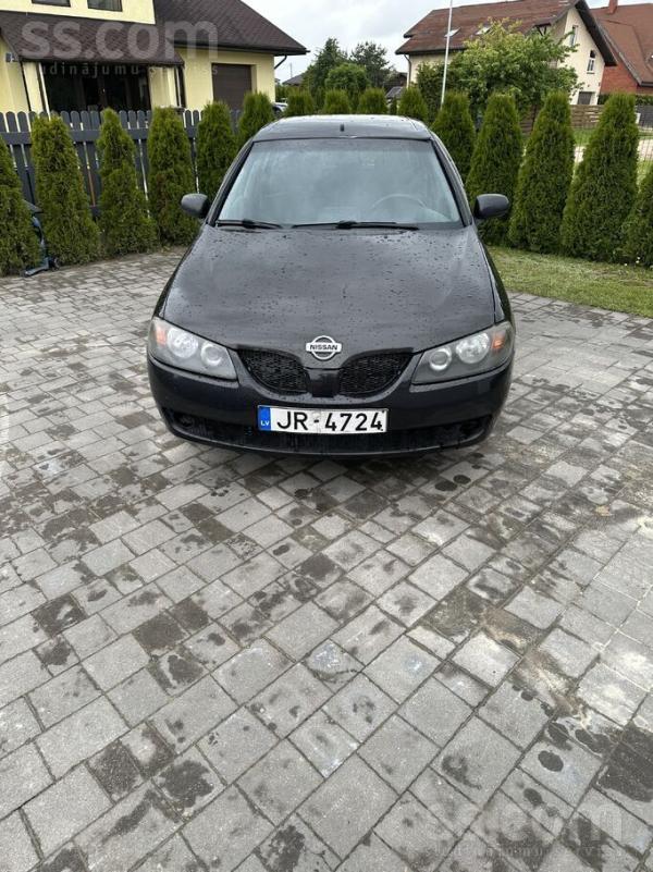 Black Nissan Almera 2003 in Jelgava, with an engine capacity of 2.20 L and mileage of 370 thousand km for 1090 €, photo 2 on AUTOMOTO.COM.LV