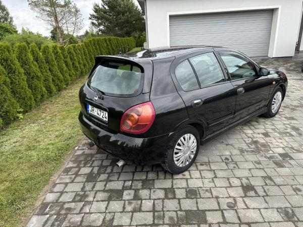 Black Nissan Almera 2003 in Jelgava, with an engine capacity of 2.20 L and mileage of 370 thousand km for 1090 €, photo 6 on AUTOMOTO.COM.LV