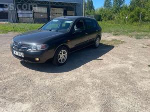 Black Nissan Almera 2003 in Riga, with an engine capacity of 1.50 L and mileage of 0 thousand km for 1899 €, photo 6 on AUTOMOTO.COM.LV