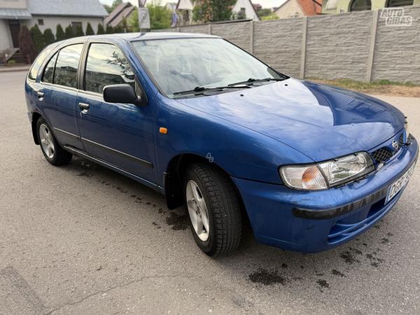 Blue Nissan Almera 1998 in Kaunas, with an engine capacity of 1.60 L and mileage of 187 thousand km for 950 €, photo 3 on AUTOMOTO.COM.LV