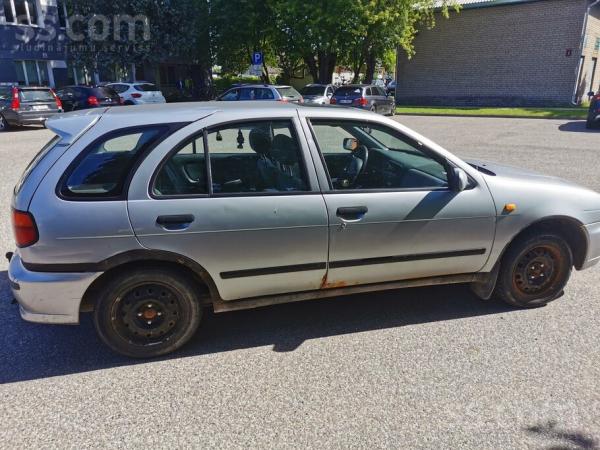Zils Nissan Almera 1998 Limbaži, ar dzinēja tilpumu 2.00 L un nobraukumu 404 tūkst. km par 450 €, foto 3 vietnē AUTOMOTO.COM.LV