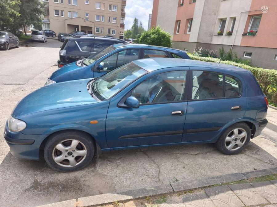 Zils Nissan Almera 2003 Panevēža, ar dzinēja tilpumu 1.50 L un nobraukumu 231 tūkst. km par 599 €, foto 4 vietnē AUTOMOTO.COM.LV
