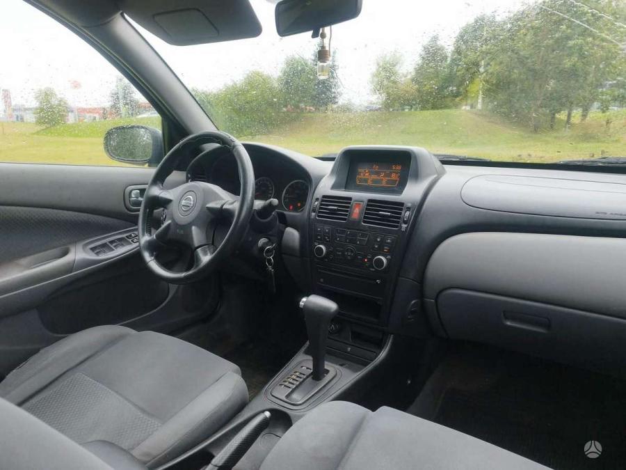 Blue Nissan Almera 2003 in Vilnius, with an engine capacity of 1.50 L and mileage of 235 thousand km for 1100 €, photo 12 on AUTOMOTO.COM.LV