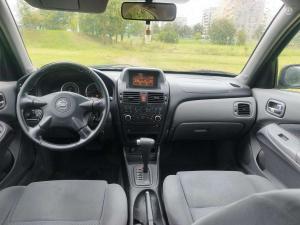 Blue Nissan Almera 2003 in Vilnius, with an engine capacity of 1.50 L and mileage of 235 thousand km for 1100 €, photo 13 on AUTOMOTO.COM.LV