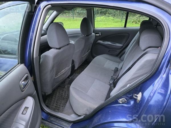 Nissan Almera 2003 in Riga on AUTOMOTO.COM.LV Blue Nissan Almera 2003 in Riga, with an engine capacity of 1.50 L and mileage of 189 thousand km for 1200 €, photo 6 on AUTOMOTO.COM.LV