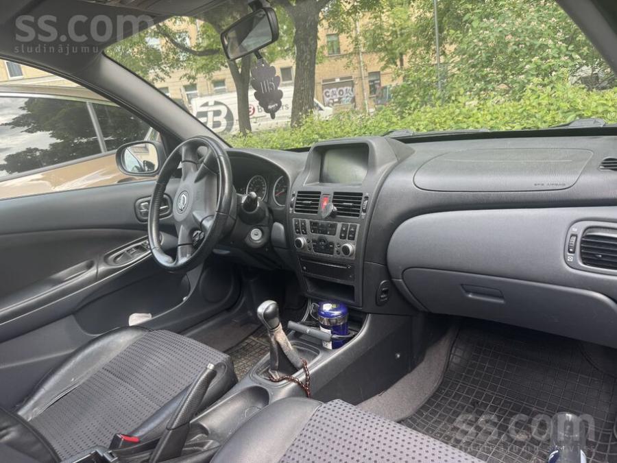 Blue Nissan Almera 2006 in Riga, with an engine capacity of 1.50 L and mileage of 222 thousand km for 500 €, photo 7 on AUTOMOTO.COM.LV