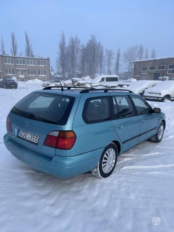 Blue Nissan Almera 2006 in Kretinga, with an engine capacity of 1.60 L and mileage of 245 thousand km for 1099 €, photo 3 on AUTOMOTO.COM.LV