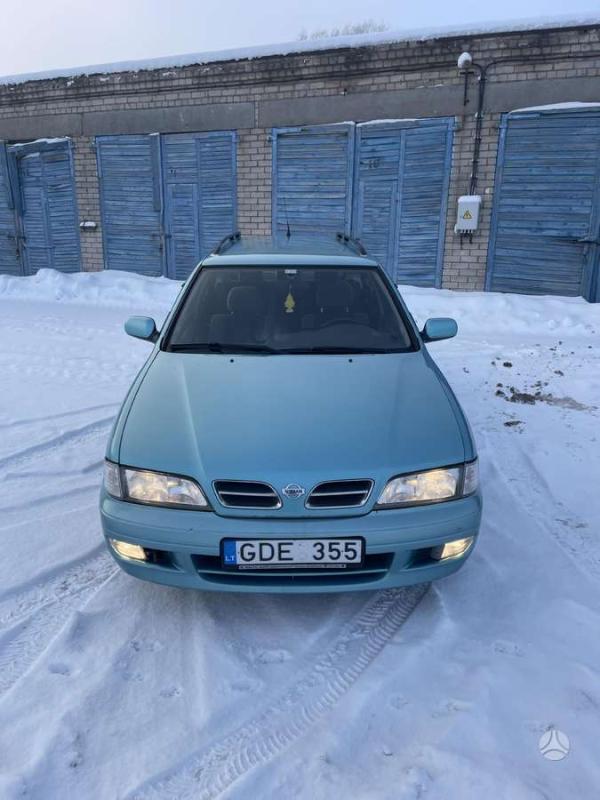 Blue Nissan Almera 2006 in Kretinga, with an engine capacity of 1.60 L and mileage of 245 thousand km for 1099 €, photo 5 on AUTOMOTO.COM.LV