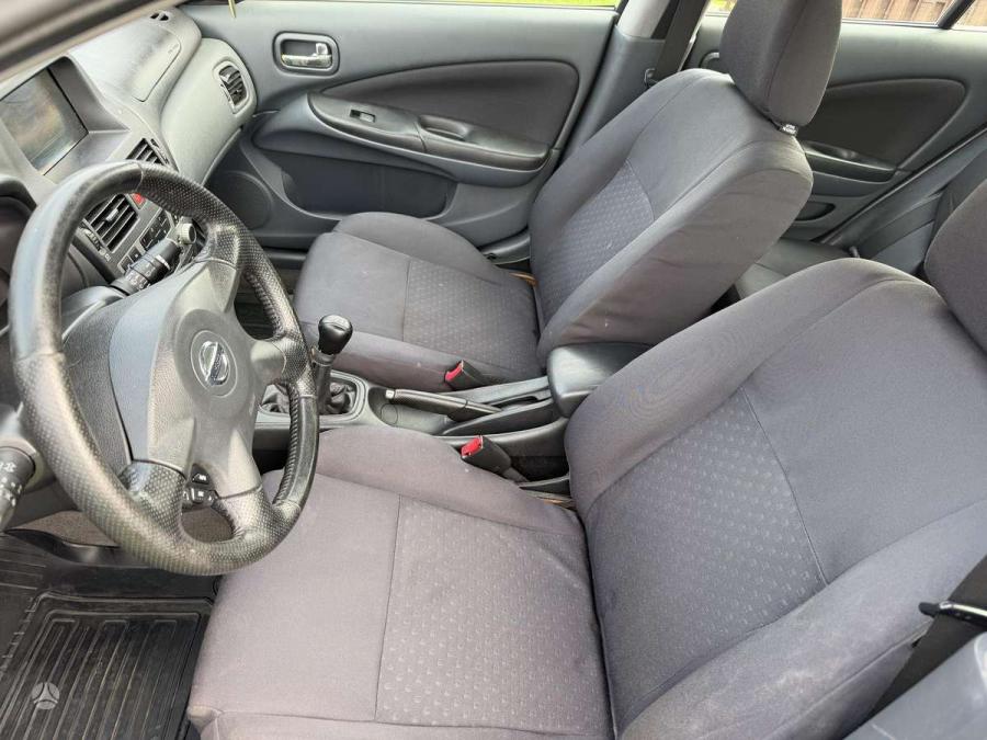 Blue Nissan Almera 2006 in Vilnius, with an engine capacity of 1.50 L and mileage of 298 thousand km for 950 €, photo 6 on AUTOMOTO.COM.LV
