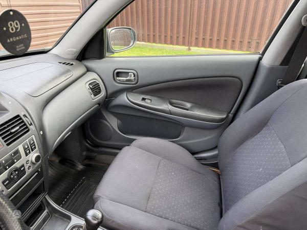 Blue Nissan Almera 2006 in Vilnius, with an engine capacity of 1.50 L and mileage of 298 thousand km for 950 €, photo 6 on AUTOMOTO.COM.LV
