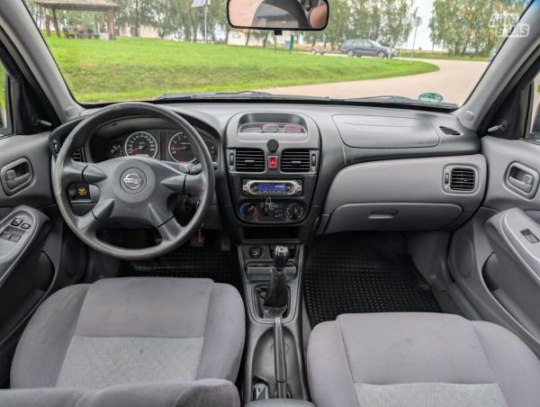 Brūns Nissan Almera 2003 Vilkaviškis, ar dzinēja tilpumu 1.50 L un nobraukumu 260 tūkst. km par 700 €, foto 9 vietnē AUTOMOTO.COM.LV