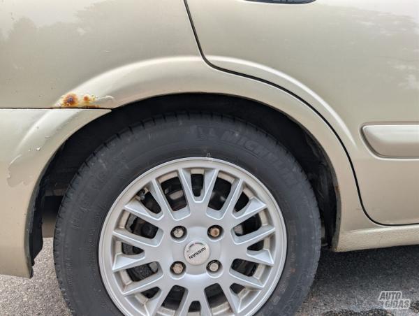Brūns Nissan Almera 2003 Vilkaviškis, ar dzinēja tilpumu 1.50 L un nobraukumu 260 tūkst. km par 700 €, foto 11 vietnē AUTOMOTO.COM.LV