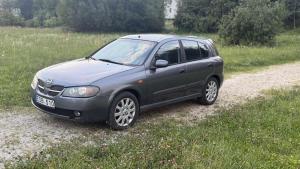 Brūns Nissan Almera 2004 Viļņa, ar dzinēja tilpumu 1.50 L un nobraukumu 320 tūkst. km par 550 €, foto 3 vietnē AUTOMOTO.COM.LV