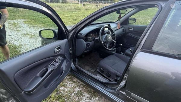 Brūns Nissan Almera 2004 Viļņa, ar dzinēja tilpumu 1.50 L un nobraukumu 320 tūkst. km par 550 €, foto 9 vietnē AUTOMOTO.COM.LV