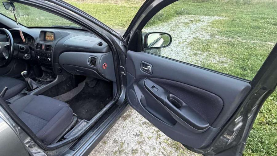 Brūns Nissan Almera 2004 Viļņa, ar dzinēja tilpumu 1.50 L un nobraukumu 320 tūkst. km par 550 €, foto 12 vietnē AUTOMOTO.COM.LV