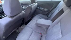 Brūns Nissan Almera 2004 Viļņa, ar dzinēja tilpumu 1.50 L un nobraukumu 320 tūkst. km par 550 €, foto 16 vietnē AUTOMOTO.COM.LV
