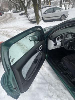 Green Nissan Almera 2000 in Kaunas, with an engine capacity of 1.80 L and mileage of 185 thousand km for 450 €, photo 15 on AUTOMOTO.COM.LV