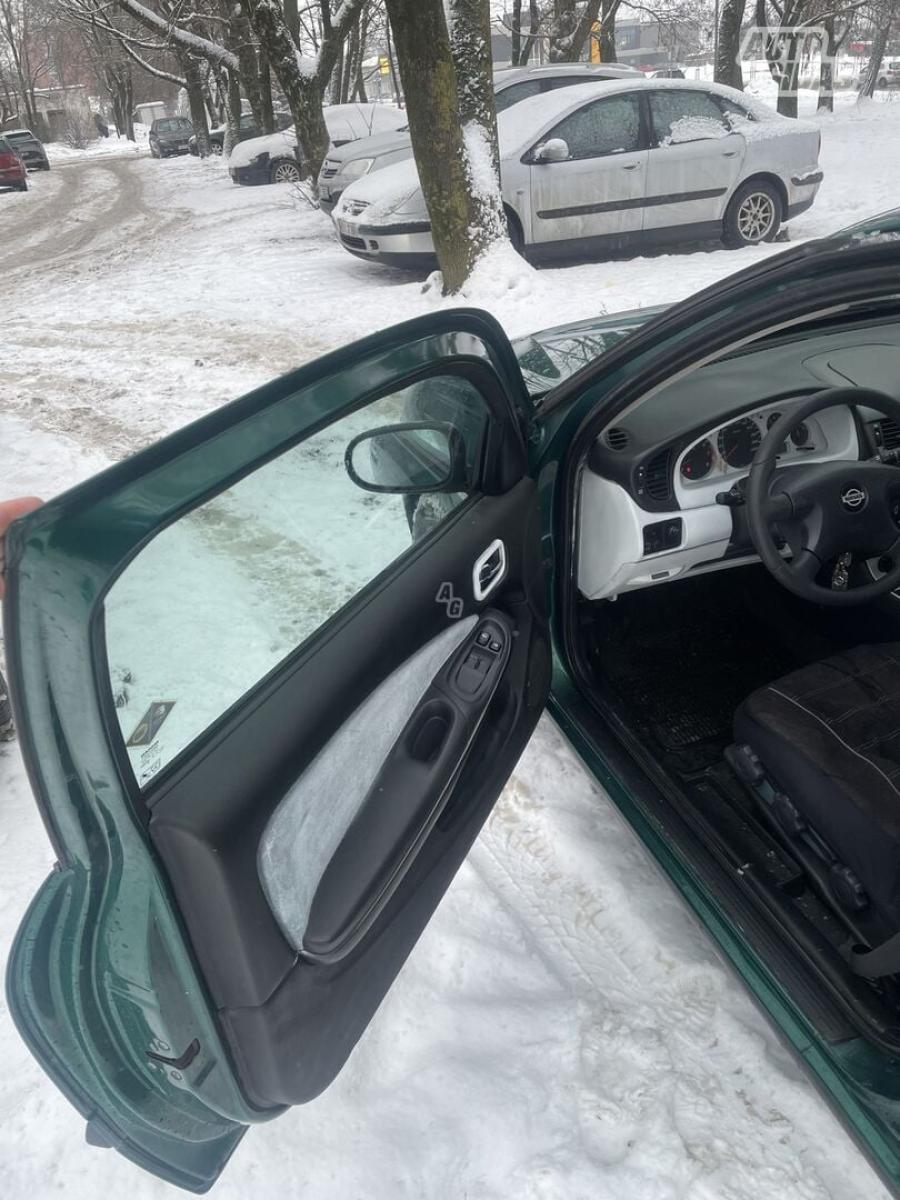 Green Nissan Almera 2000 in Kaunas, with an engine capacity of 1.80 L and mileage of 185 thousand km for 450 €, photo 15 on AUTOMOTO.COM.LV