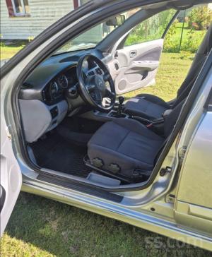 Pelēks Nissan Almera 2003 Rīga, ar dzinēja tilpumu 2.20 L un nobraukumu 259 tūkst. km par 750 €, foto 7 vietnē AUTOMOTO.COM.LV