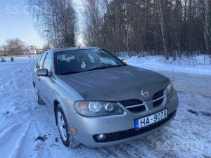 Pelēks Nissan Almera 2006 Rīga, ar dzinēja tilpumu 1.60 L un nobraukumu 266 tūkst. km par 1000 €, foto  vietnē AUTOMOTO.COM.LV