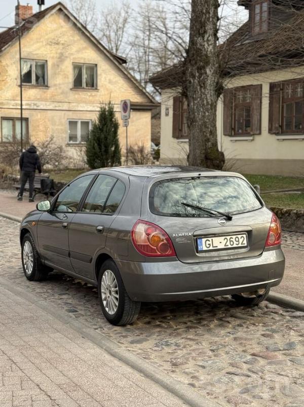 Grey Nissan Almera 2003 in Kuldiga, with an engine capacity of 2.20 L and mileage of 246 thousand km for 1600 €, photo 3 on AUTOMOTO.COM.LV