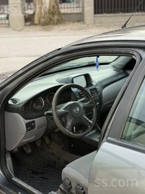 Pelēks Nissan Almera 2003 Kuldīga, ar dzinēja tilpumu 2.20 L un nobraukumu 246 tūkst. km par 1600 €, foto 11 vietnē AUTOMOTO.COM.LV