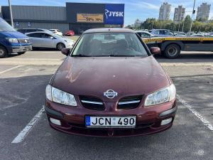 Red Nissan Almera 2002 in Vilnius, with an engine capacity of 1.50 L and mileage of 180 thousand km for 380 €, photo 3 on AUTOMOTO.COM.LV