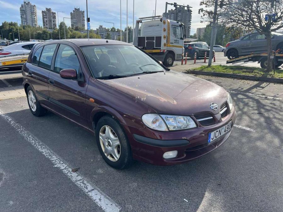 Red Nissan Almera 2002 in Vilnius, with an engine capacity of 1.50 L and mileage of 180 thousand km for 380 €, photo 4 on AUTOMOTO.COM.LV