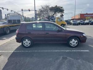 Red Nissan Almera 2002 in Vilnius, with an engine capacity of 1.50 L and mileage of 180 thousand km for 380 €, photo 5 on AUTOMOTO.COM.LV