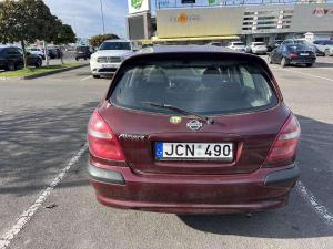 Red Nissan Almera 2002 in Vilnius, with an engine capacity of 1.50 L and mileage of 180 thousand km for 380 €, photo 7 on AUTOMOTO.COM.LV