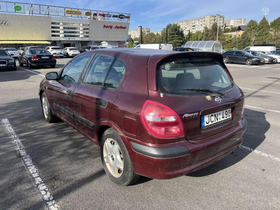 Red Nissan Almera 2002 in Vilnius, with an engine capacity of 1.50 L and mileage of 180 thousand km for 380 €, photo 8 on AUTOMOTO.COM.LV