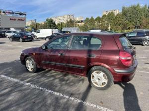 Red Nissan Almera 2002 in Vilnius, with an engine capacity of 1.50 L and mileage of 180 thousand km for 380 €, photo 9 on AUTOMOTO.COM.LV