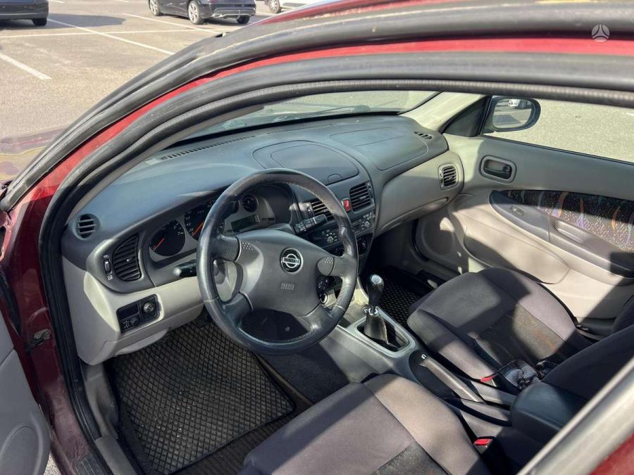 Red Nissan Almera 2002 in Vilnius, with an engine capacity of 1.50 L and mileage of 180 thousand km for 380 €, photo 10 on AUTOMOTO.COM.LV